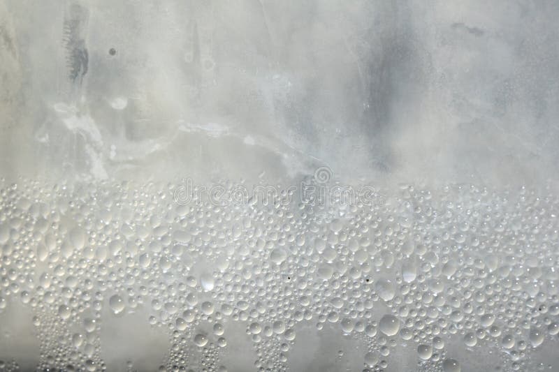 Water Condensation Small Bubbles Moisture on a Glass Window Close Up ...