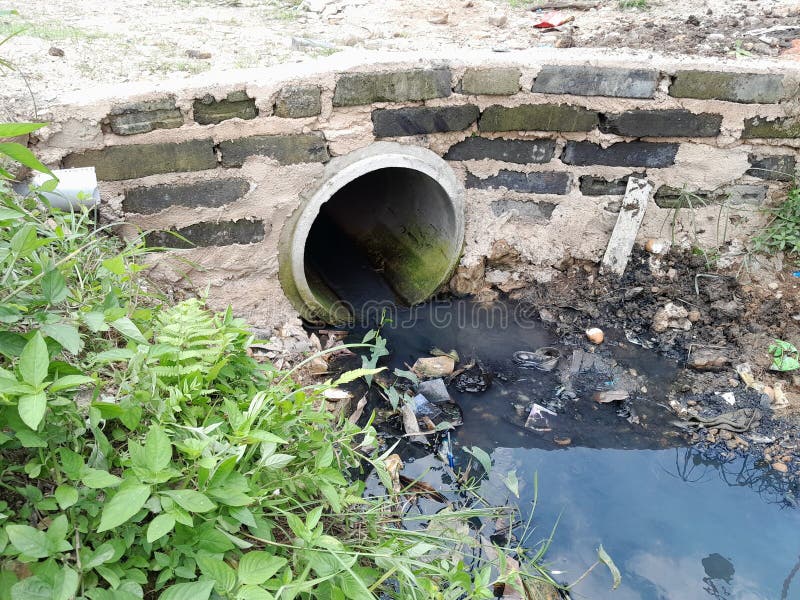 The Water is Contaminated with Murky Colored Waste that Flows into a ...