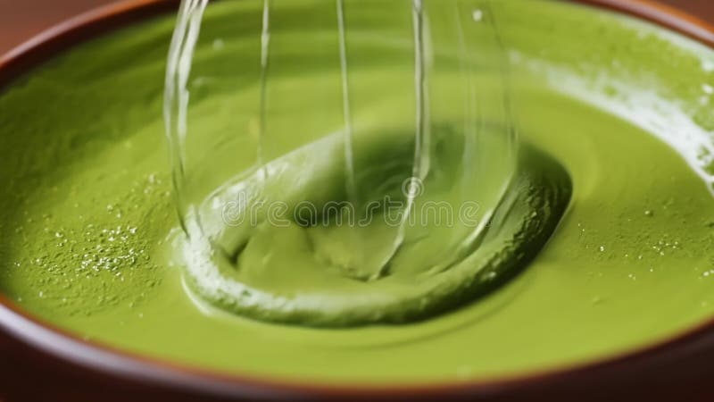 Water Creating Bubbles Falling on Matcha Green Tea Surface Stock Video ...