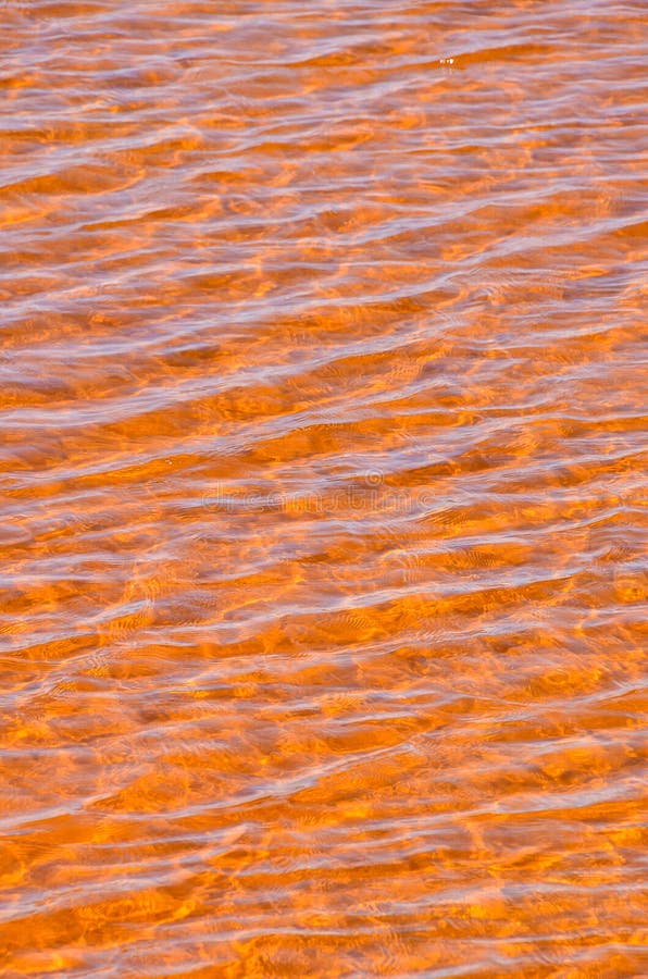 The Water is a Deep Orange Color Stock Photo - Image of texture, orange ...