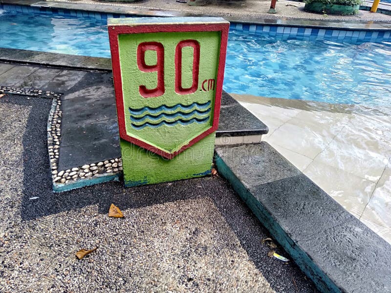 Water Depth Sign at the Edge of Swimming Pool. Stock Photo - Image of ...
