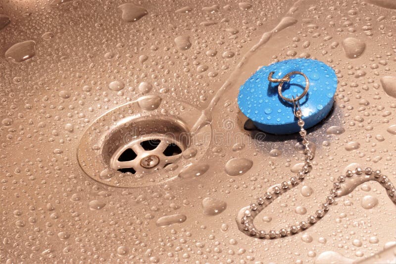 Water Drain, Drops on the Sink and Drain Plug. Stock Photo - Image of ...
