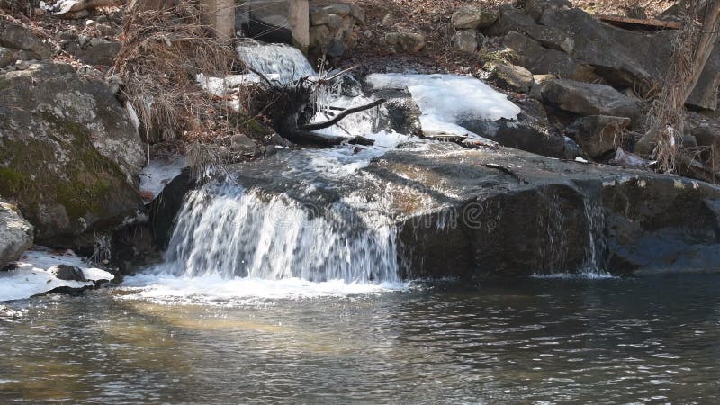 Water Cascading Off Rock Ledge into River Stock Footage - Video of ...