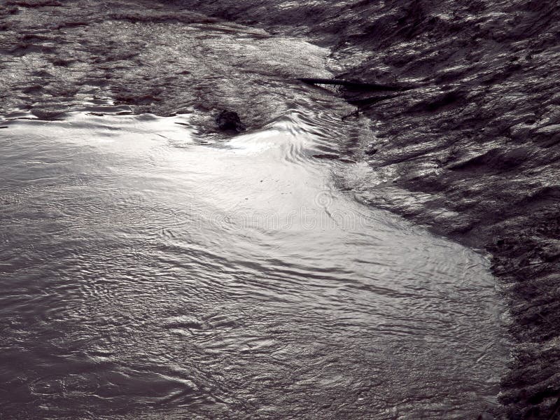 Water drenched mud flats stock image. Image of flats - 142260569