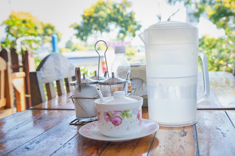 Water Drink in Clear Plastic Jug on Wood Table Stock Photo - Image of ...