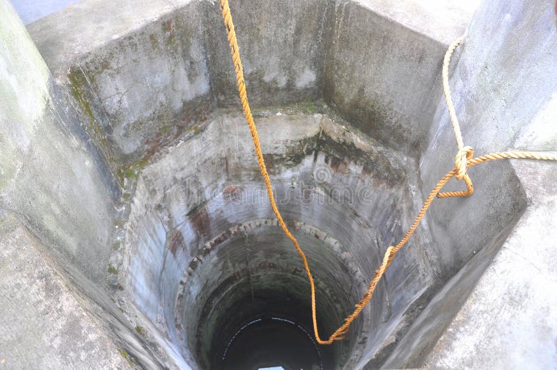 Water Drinking Well stock photo. Image of rope, drilled - 111160264
