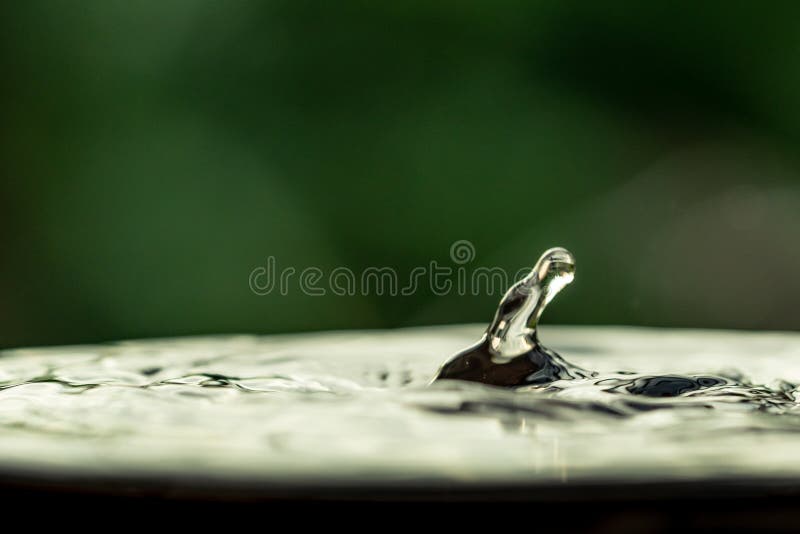 Water drip close macro stock photo. Image of energy - 143300496