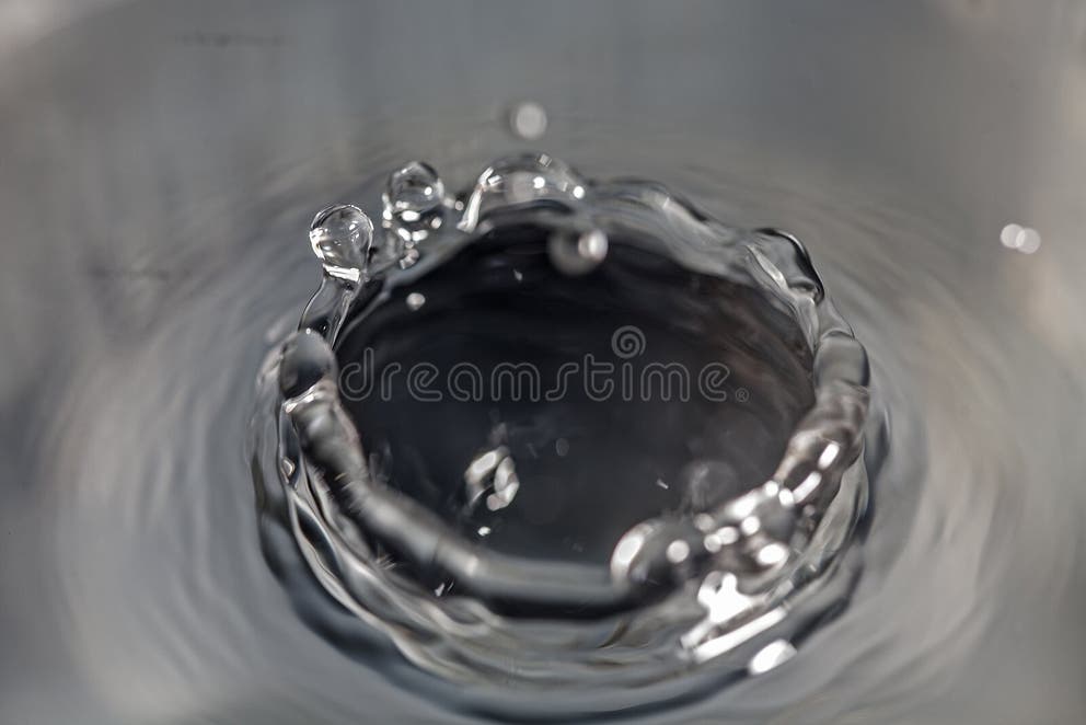 Water drip stock image. Image of white, circle, clear - 158477897