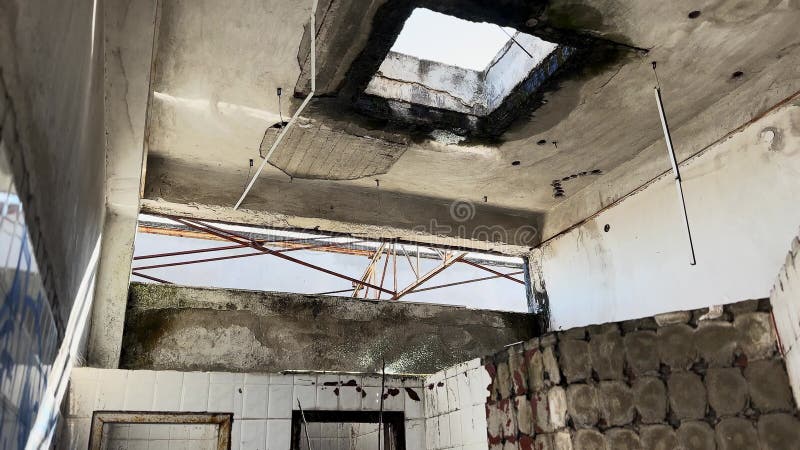 Water Dripping Down from a Shelling Window, Abandoned Industrial ...