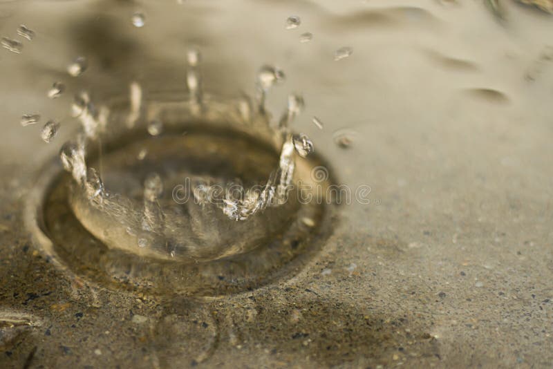 Dripping Down from the Roof of the House Makes the Water Below Diffuse ...