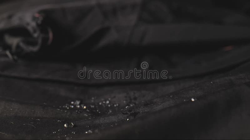 Water Dripping Onto Waterproof Fabric. Water Jet on Water Resistant ...