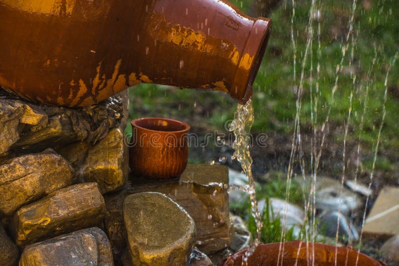 Water Dripping through a Pot in the Nature Stock Image - Image of ...