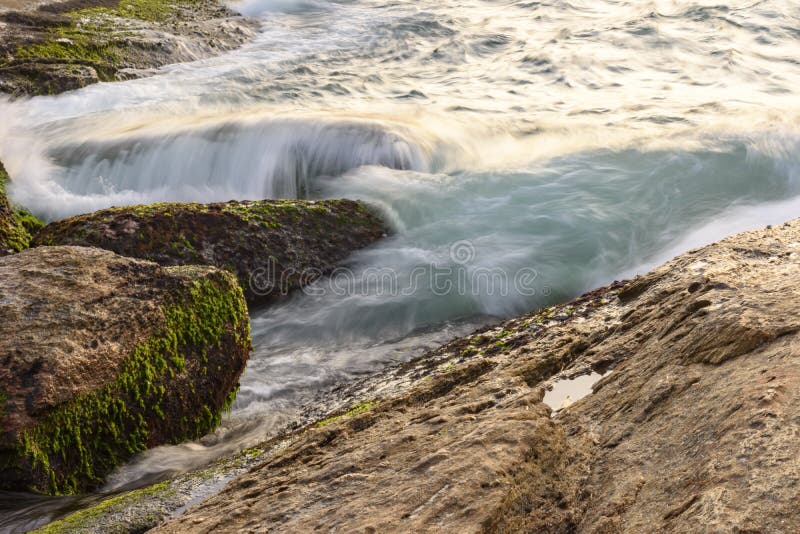 Water Dripping between Rocks Stock Image - Image of coastal, water ...