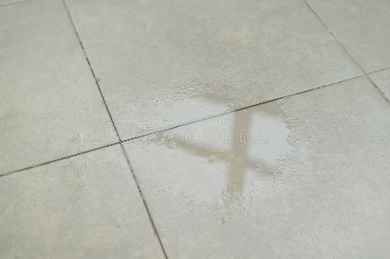 Water Drips Onto the Tiled Floor. Stock Photo - Image of floor ...
