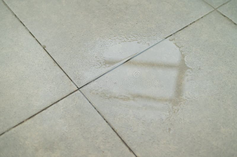 Water Drips Onto the Tiled Floor. Stock Photo - Image of drop, leak ...