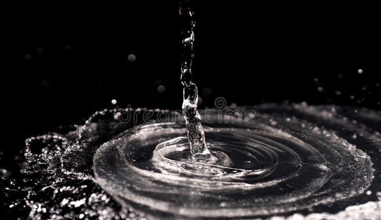 Water Drop on Black Background. Dripping Splashing Effect. Splashing ...