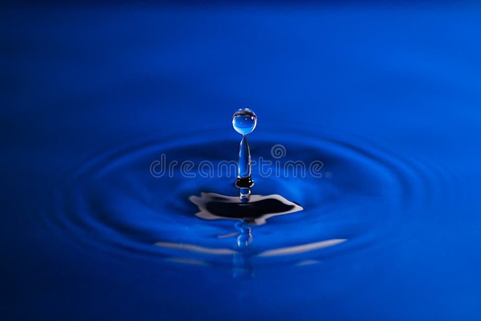 Water Drop in Blue stock photo. Image of blue, details - 84389632