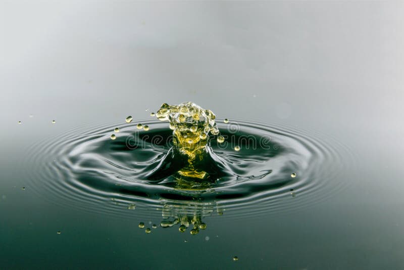 Water drop collision stock photo. Image of fluid, ripple - 84562596