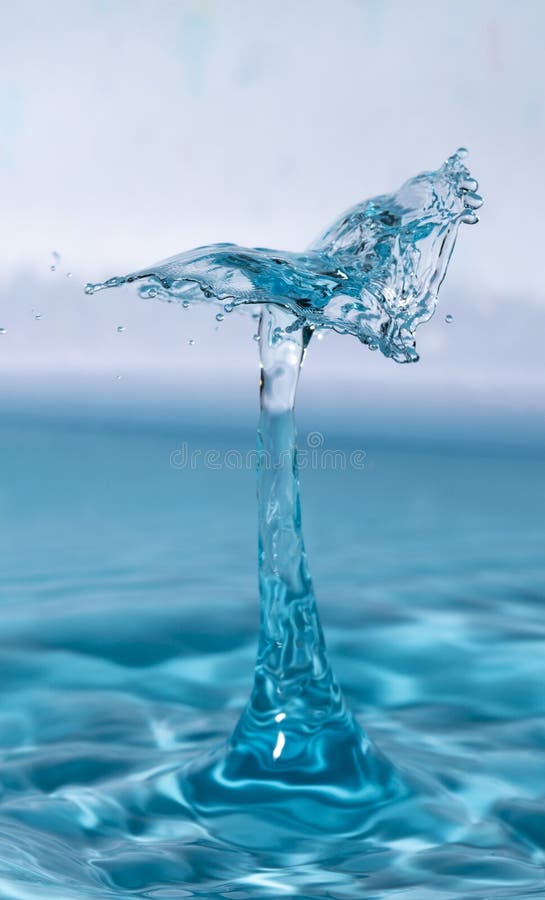 Water Drop Collision Flying High Stock Image - Image of water, impact ...