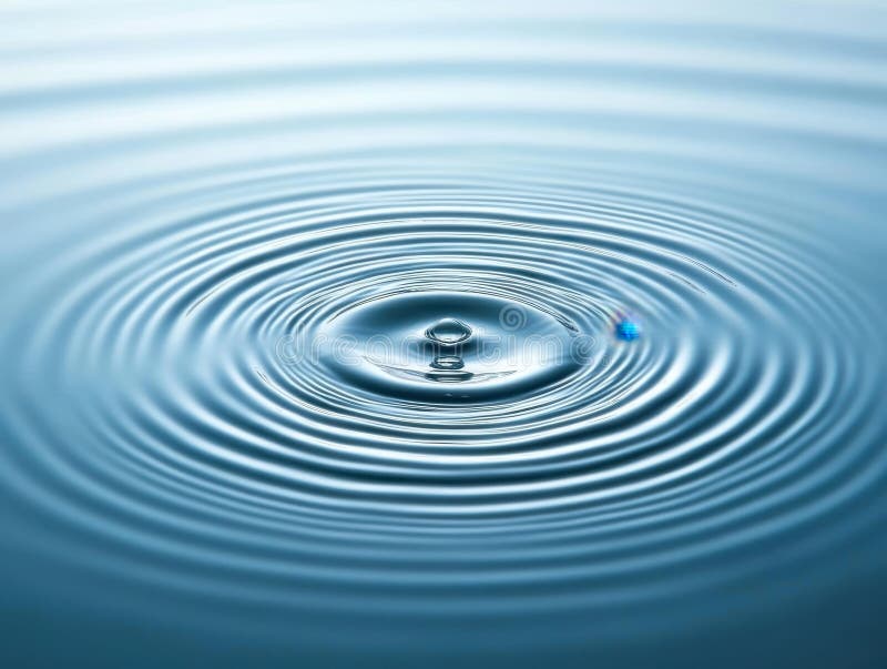 Water Drop Creating Concentric Ripples on Still Water Surface Stock ...
