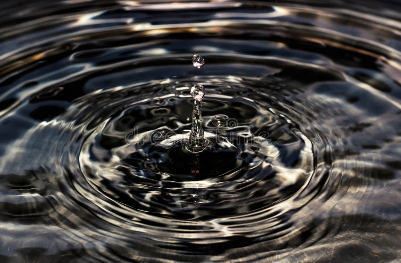 Water drop on dark tone stock photo. Image of abstract - 139185228