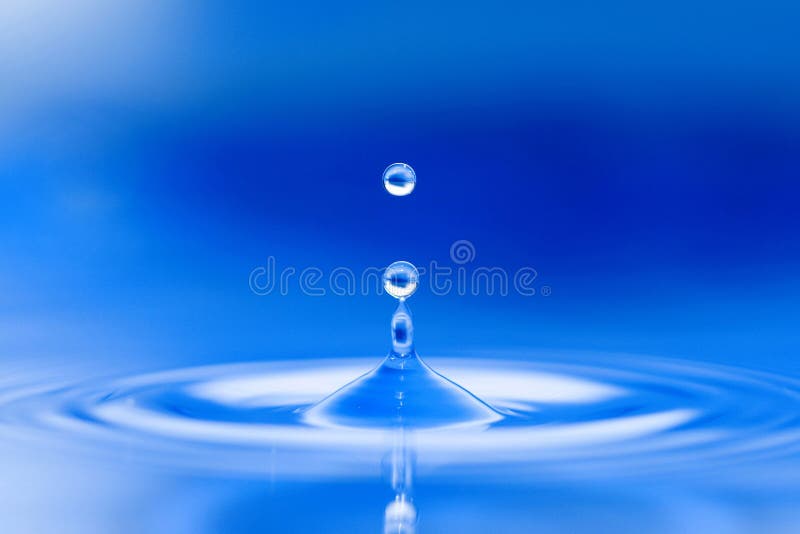 Water Drop Dripping on a Water Surface Stock Illustration ...