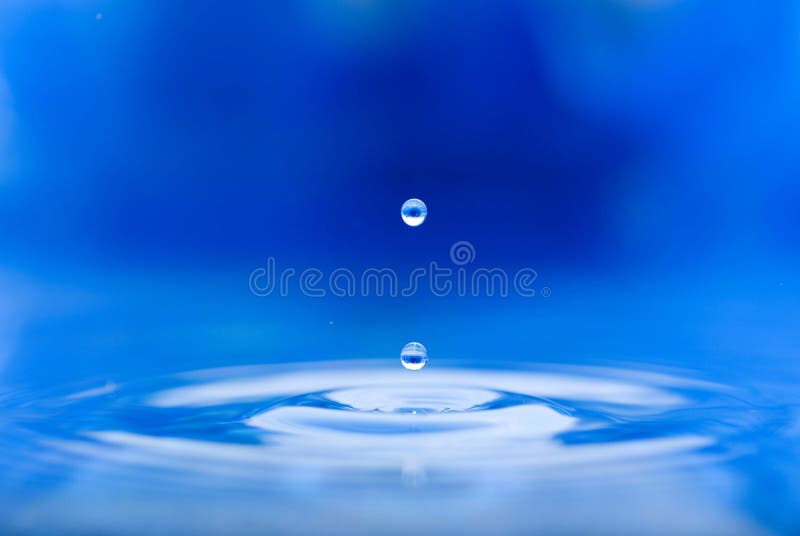 Water Drop Dripping on a Water Surface Stock Illustration ...