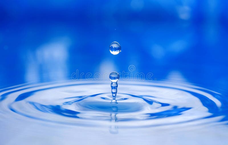 Water Drop Dripping on a Water Surface Stock Illustration ...