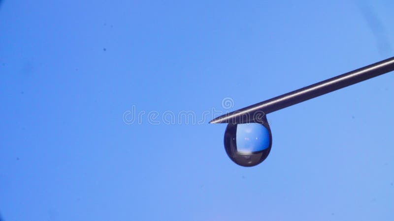 Water Drop Falling from the Syringe Needle Stock Video - Video of pure ...