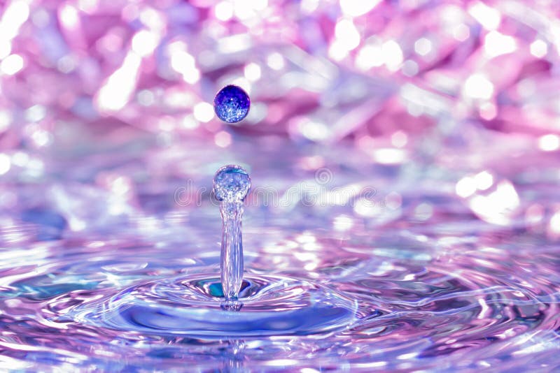 Water Drop Falling into Water . Stock Photo - Image of liquid, closeup ...