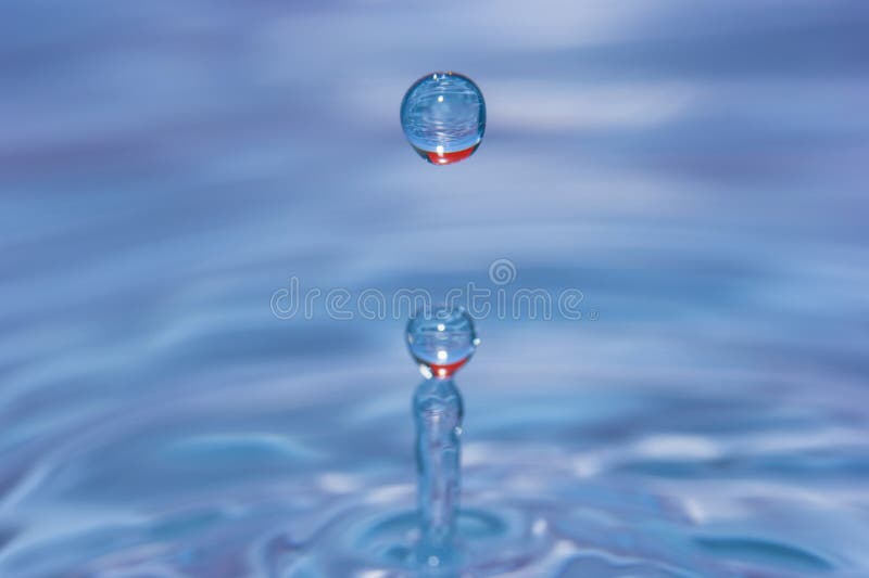 Water Drop Falling into Water Stock Photo - Image of circle, crown ...