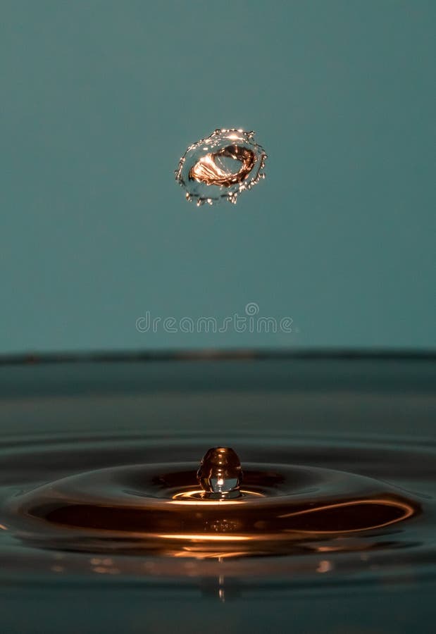 Drops of Water Fall into the Water Stock Photo - Image of bubble, macro ...