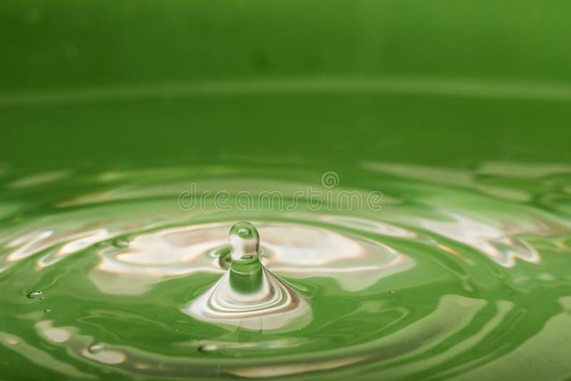 Water Drop on a Green Background Stock Photo - Image of clear, green ...