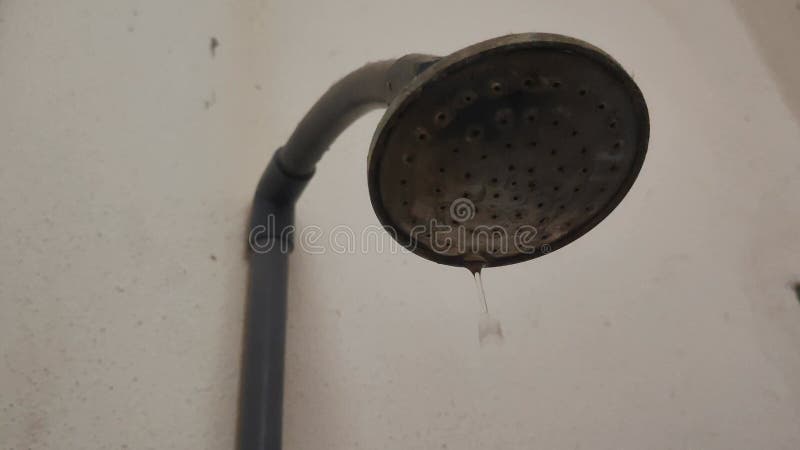 Water Drop Hanging from a Rusty Showerhead Stock Video - Video of ...