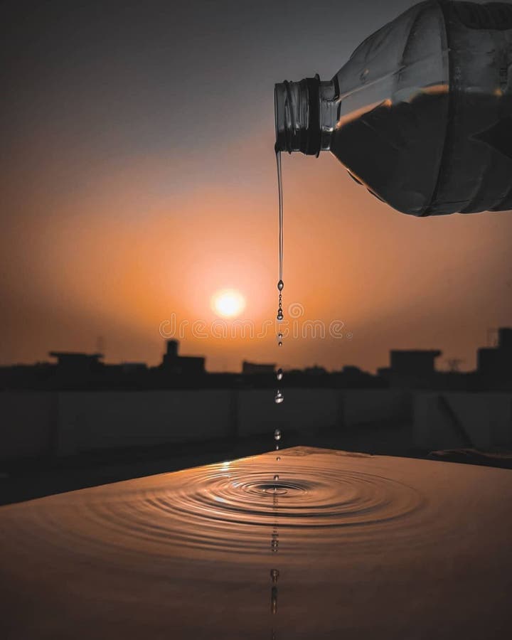 Water drop pic sunset sun. stock image. Image of sunset - 235245005