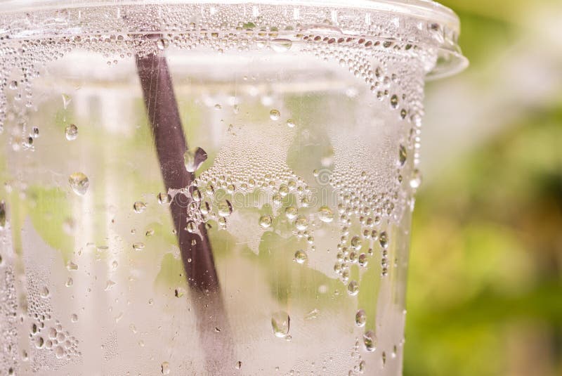 Water Drop On Plastic Bottle Of Drink With Straw Inside Stock Image ...
