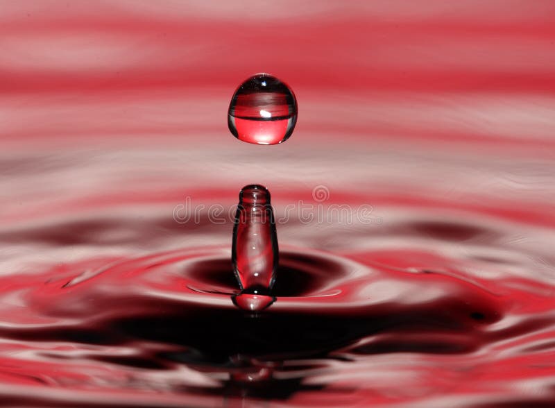 Water drop red stock image. Image of rippling, liquid - 23006871