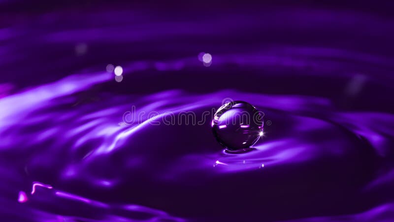 Water Drop In Purple Liquid Picture. Image: 89507829