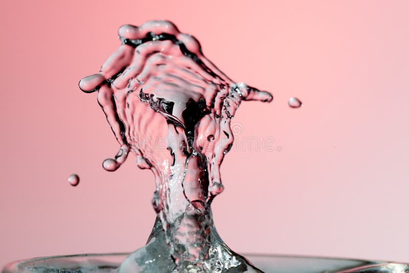 Water Drop Splash with Ripples on Water Surface Stock Image - Image of ...