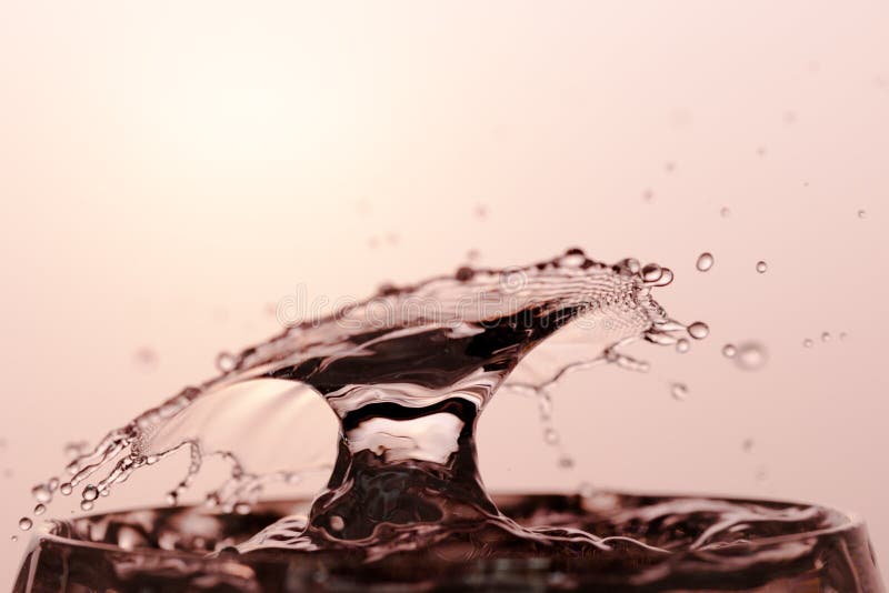 Water Drop Splash with Ripples on Water Surface Stock Photo - Image of ...