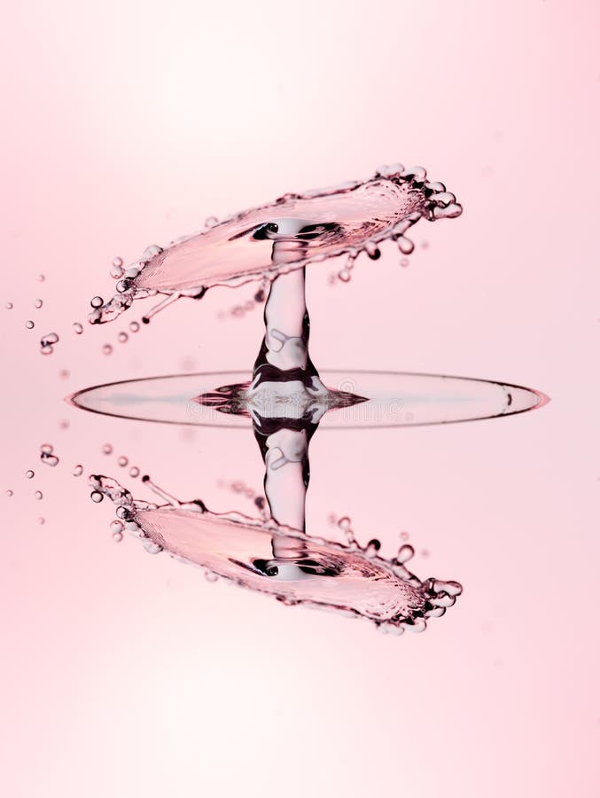 Water Drop Splash with Ripples on Water Surface Stock Photo - Image of ...