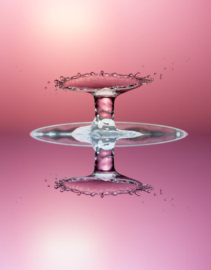 Water Drop Splash with Ripples on Water Surface Stock Photo - Image of ...