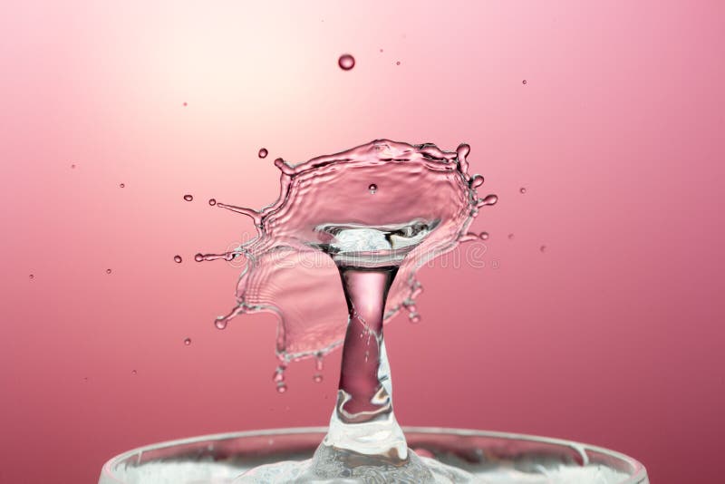 Water Drop Splash with Ripples on Water Surface Stock Image - Image of ...