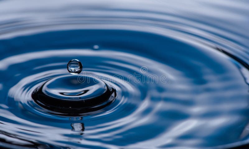 Water Drop Splash Blue Colored Stock Image - Image of white, flow ...