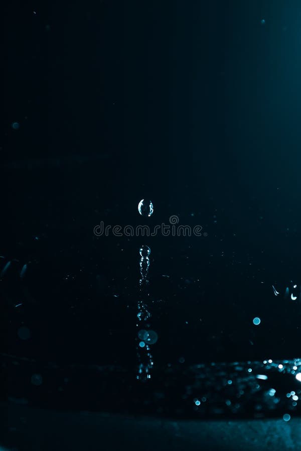 Water Drop Splash Close Up on Dark Background Stock Photo - Image of ...