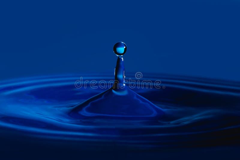 Water Drop Splash in a Glass Cup Stock Image - Image of cool, wave ...