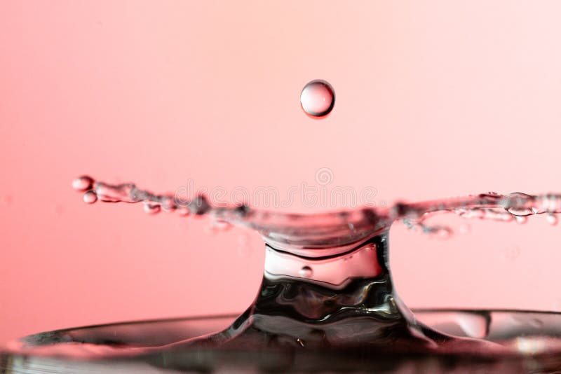 Water Drop Splash with Ripples on Water Surface Stock Image - Image of ...
