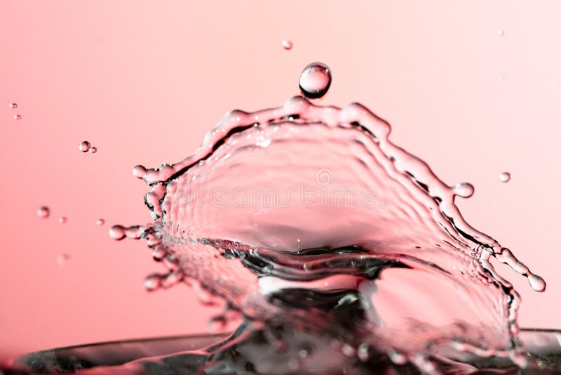 Water Drop Splash with Ripples on Water Surface Stock Photo - Image of ...