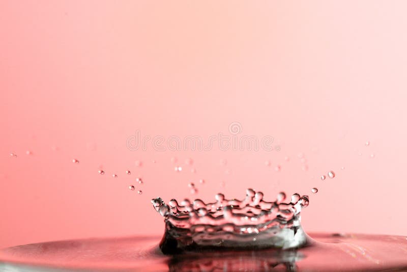 Water Drop Splash with Ripples on Water Surface Stock Photo - Image of ...