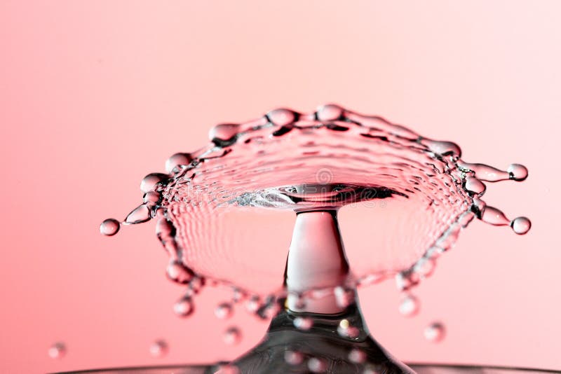 Water Drop Splash with Ripples on Water Surface Stock Image - Image of ...
